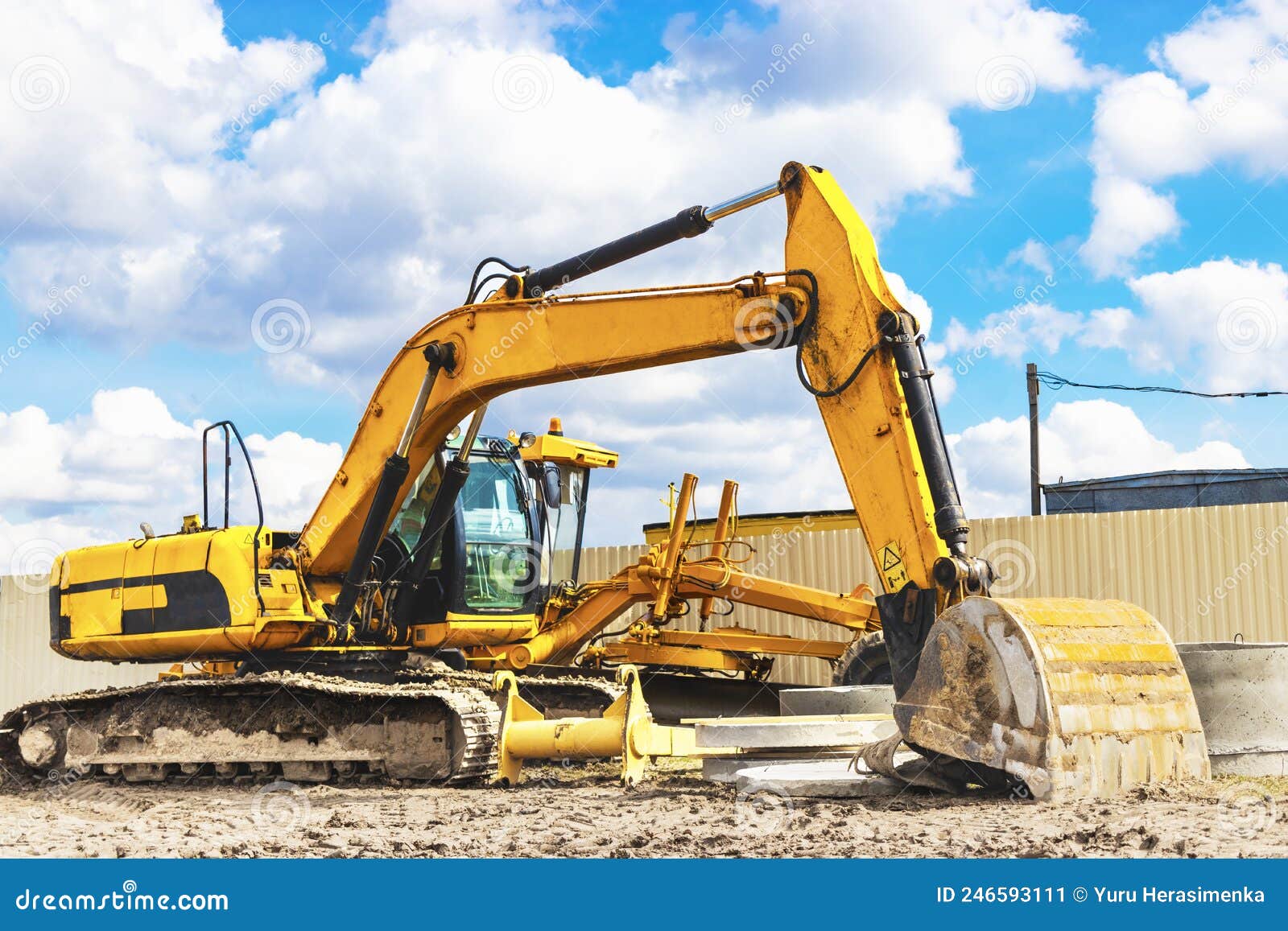 Powerful Excavator Work on a Construction Site, Sunny Blue Sky in the ...