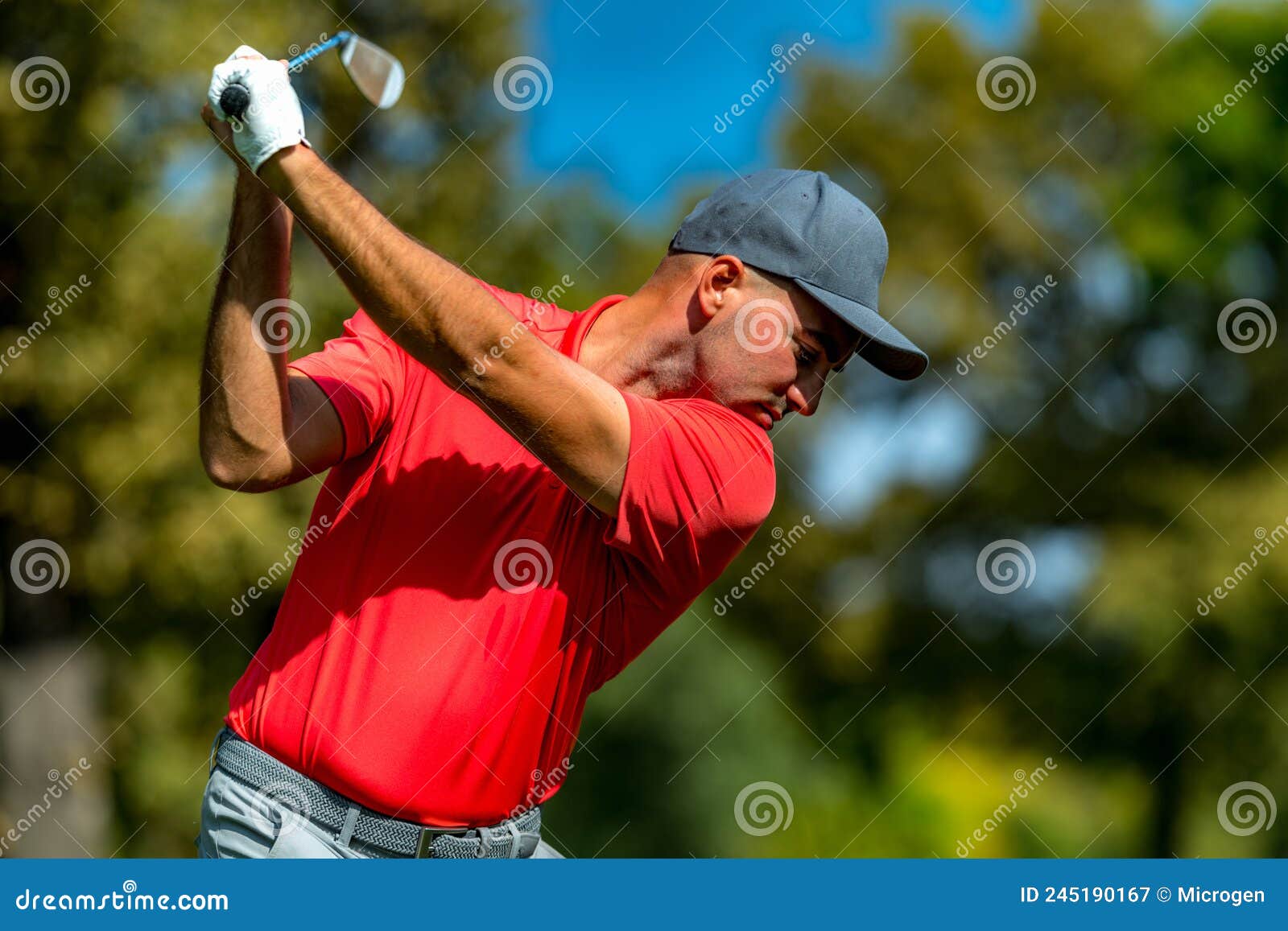 Powerful Golf Swing. Young Golfing Professional in Golf Swing Stock ...