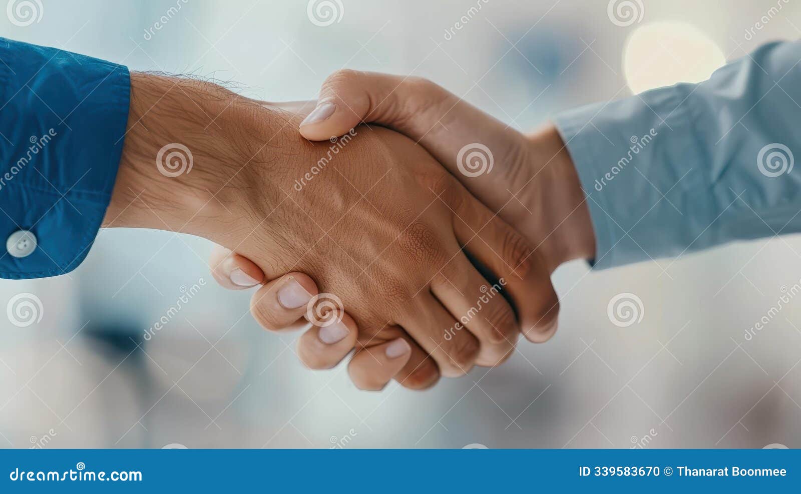 A Powerful Handshake Symbolizes Collaboration and Success in a Dynamic ...