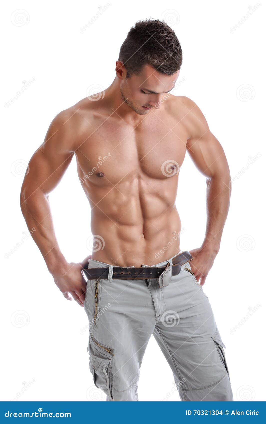 Powerful Muscular Man Posing on a White Background Stock Photo - Image ...