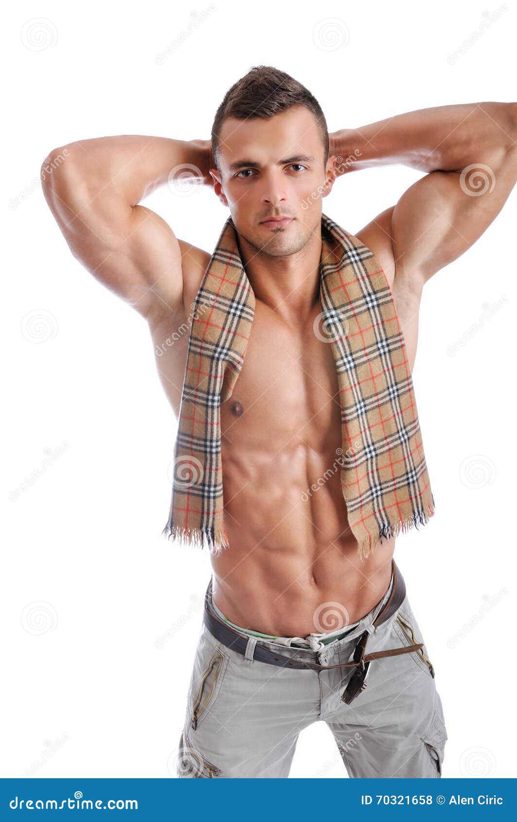 Powerful Muscular Man Posing on a White Background Stock Photo - Image ...