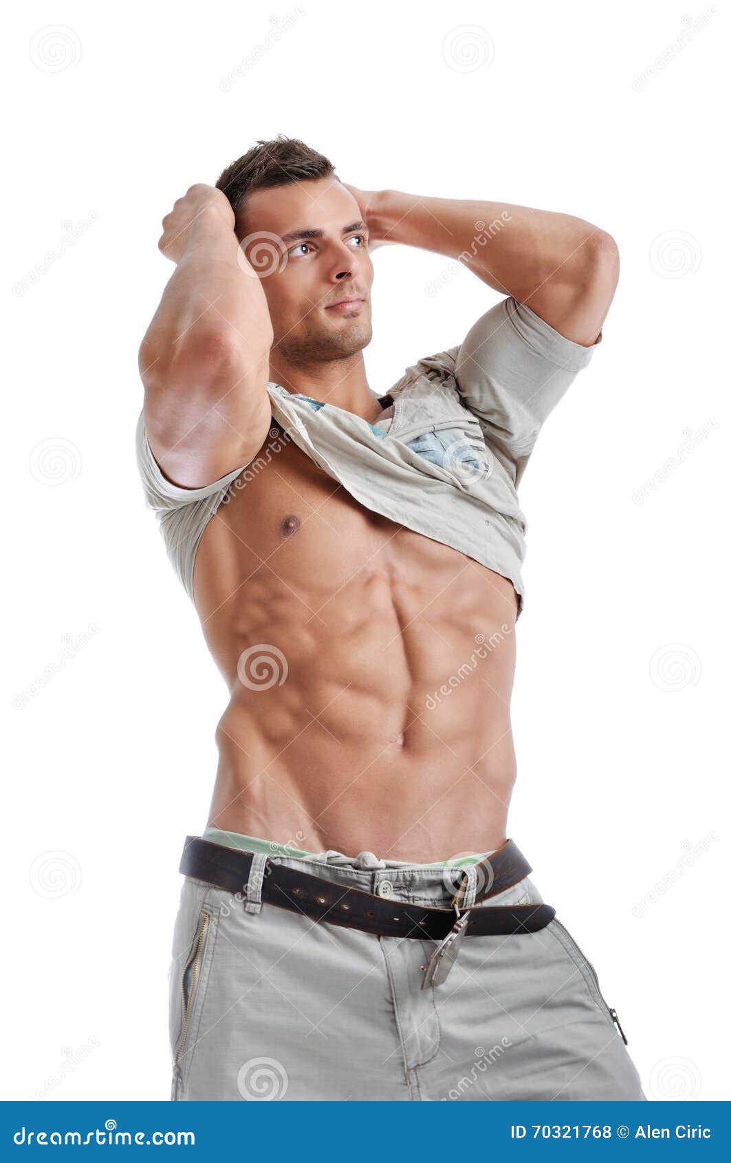Powerful Muscular Man Posing on a White Background Stock Photo - Image ...