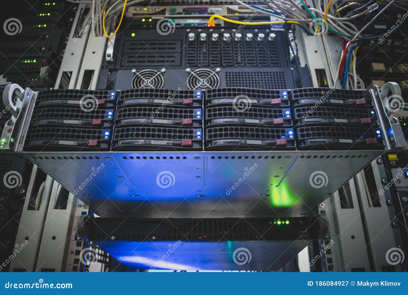 A Powerful Storage Server is in the Rack. View from the Bottom. Modern ...