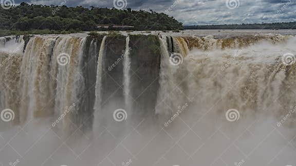 The Powerful Streams of the Waterfall Collapse into the Abyss. Stock ...