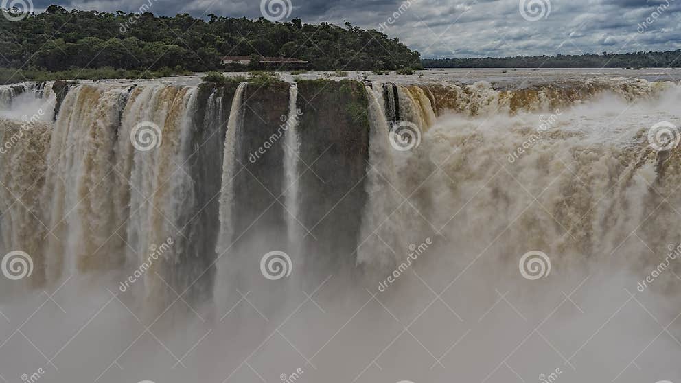 The Powerful Streams of the Waterfall Collapse into the Abyss. Stock ...