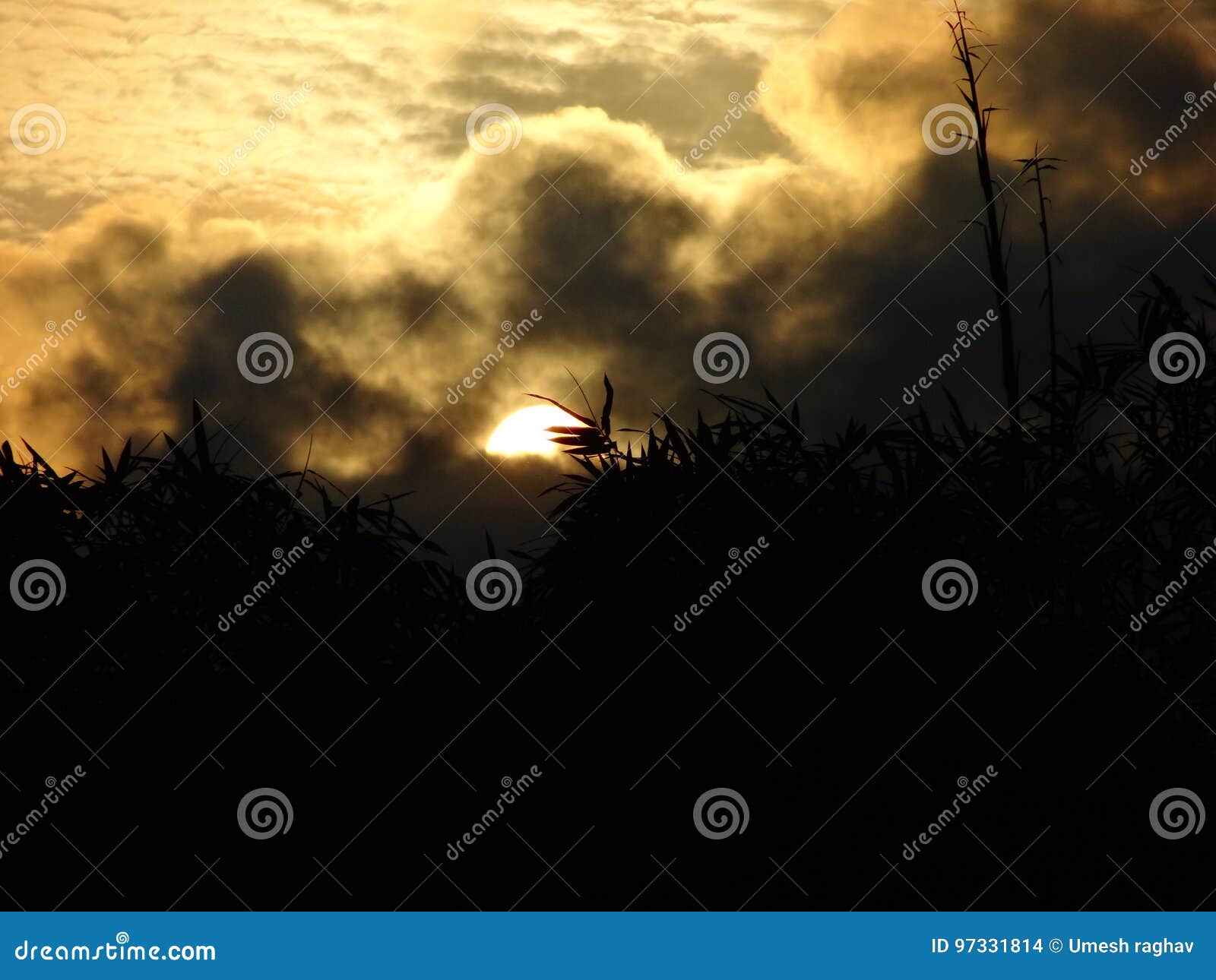 The Powerful Sun Being Engulfed by the Roaring Clouds Stock Photo ...