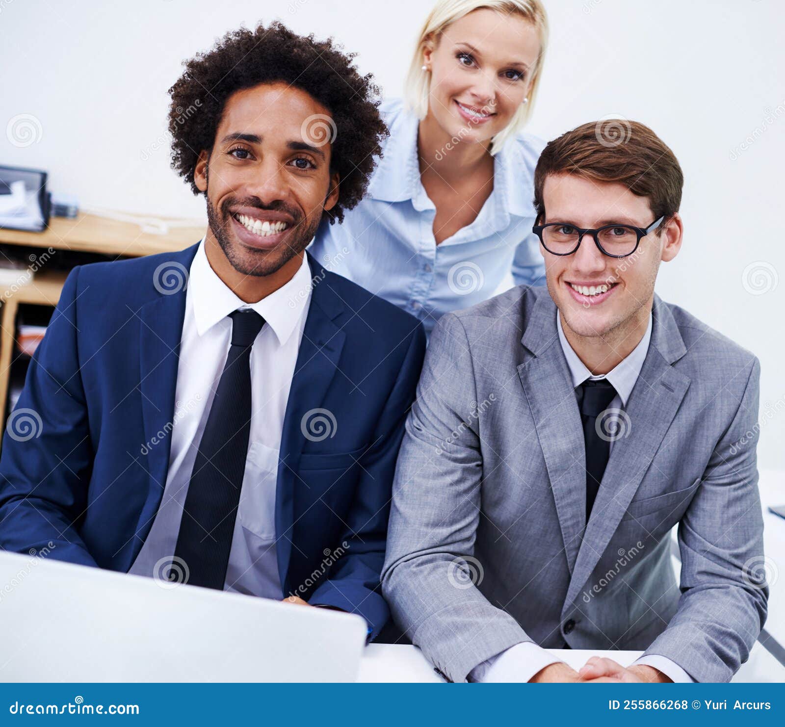 Powerful Team of Diverse Minds. Portrait of Three Colleagues Smiling at ...