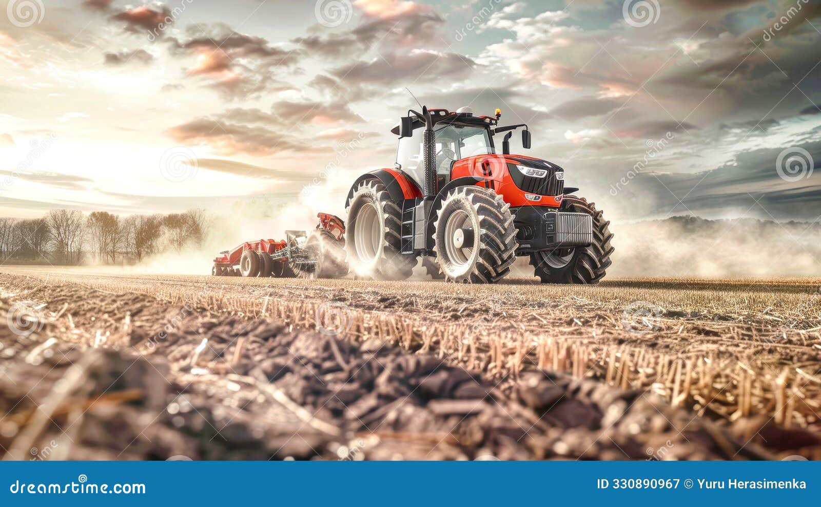 A Powerful Tractor Works Diligently, Cultivating The Land As Dust ...