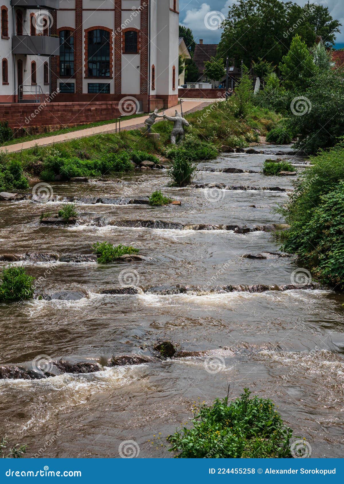 Powerful Waterfall on the Kinzig River. Full-flowing River after the ...