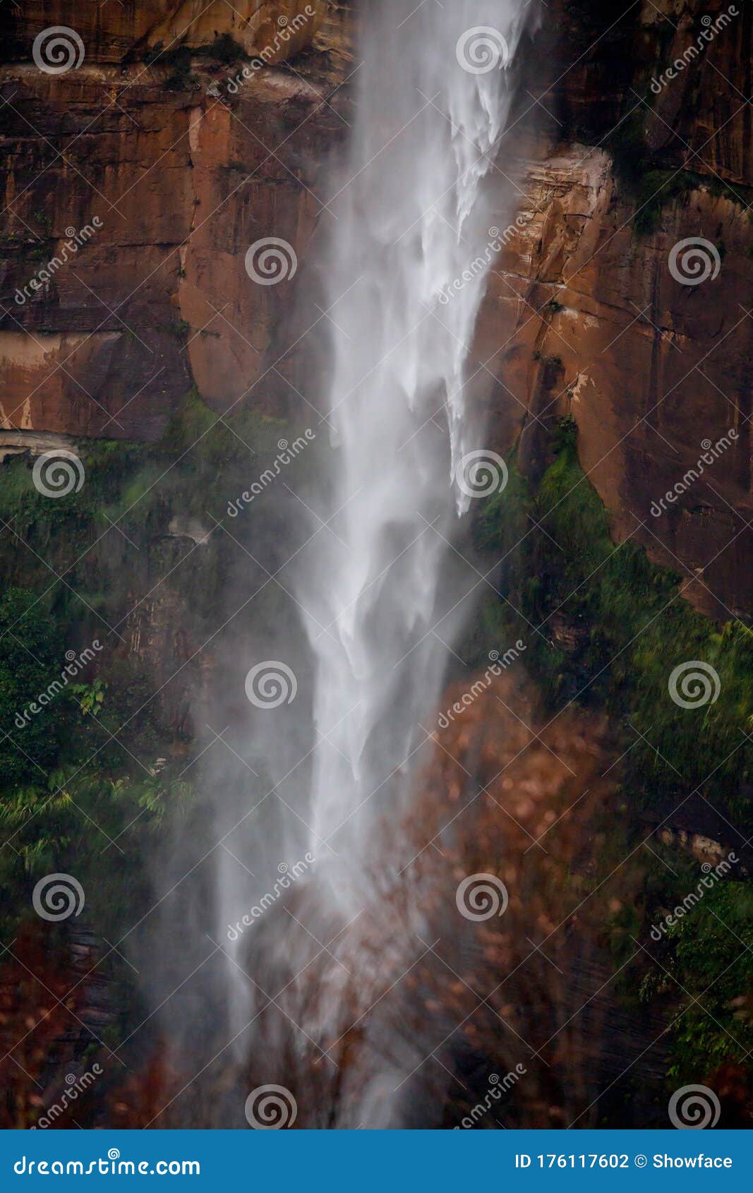 Powerful Waterfall Tumbling Over Sandstone Cliffs Stock Photo - Image ...
