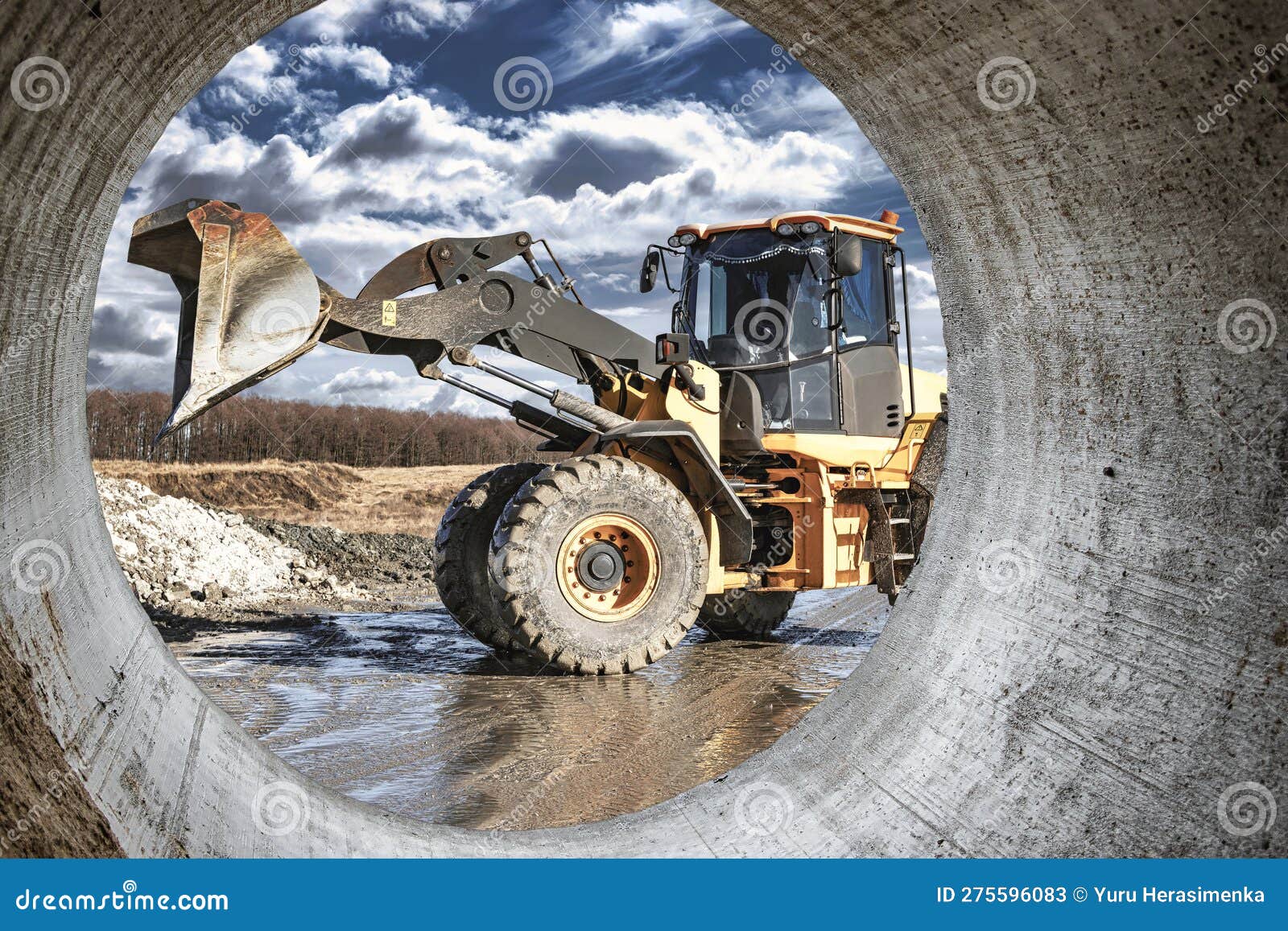 Powerful Wheel Loader or Bulldozer Working on a Quarry or Construction ...