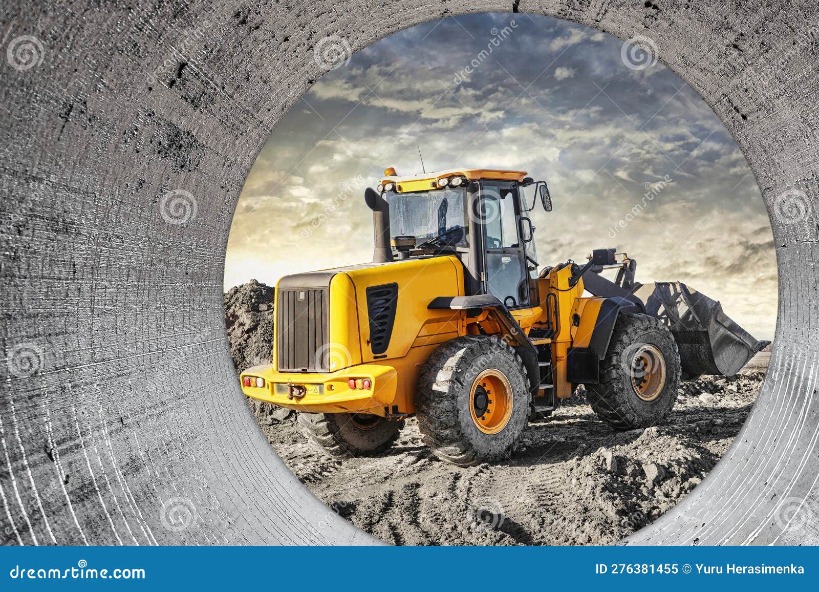 Powerful Wheel Loader or Bulldozer Working on a Quarry or Construction ...