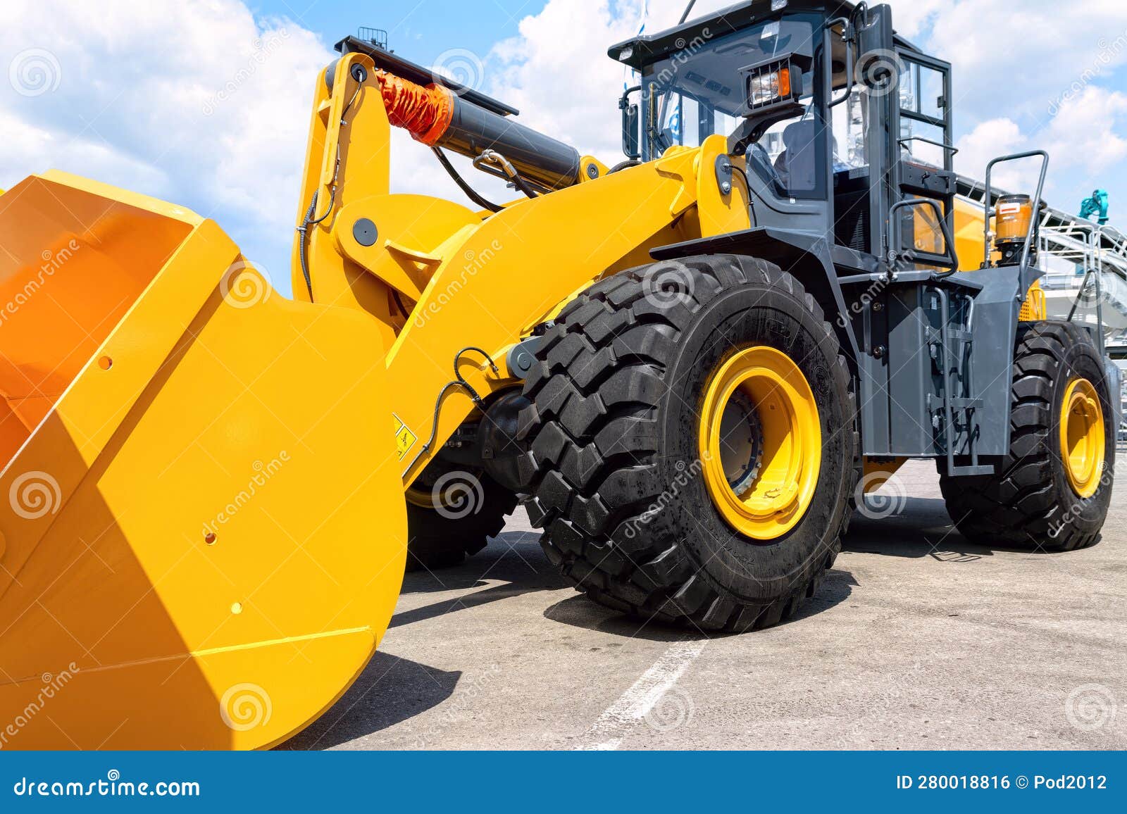 Powerful Yellow New Front Loader Stock Photo - Image of loader, yellow ...