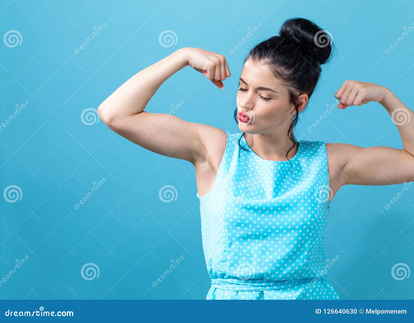Powerful Young Woman in Success Pose Stock Photo - Image of people ...