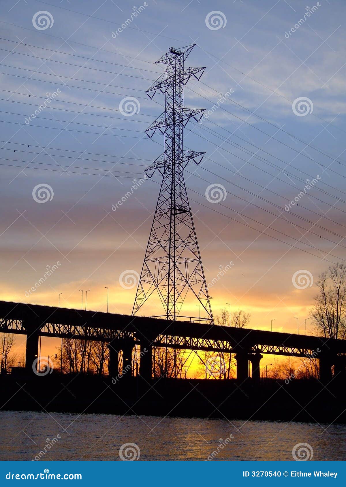 Powerline by the water stock photo. Image of sunsets, silhouette - 3270540