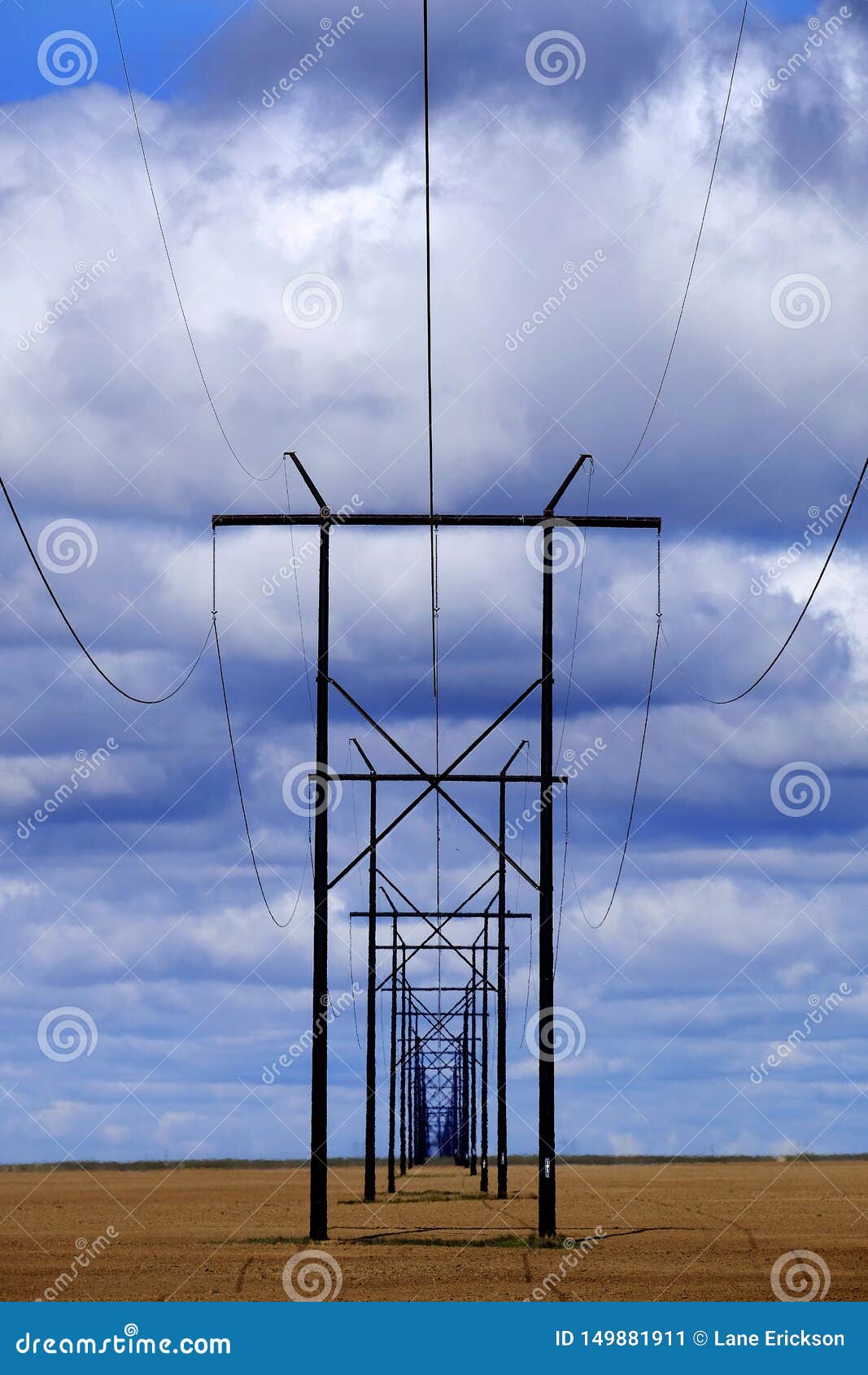 Powerlines in Field with Blue Sky and Clouds Stock Image - Image of ...