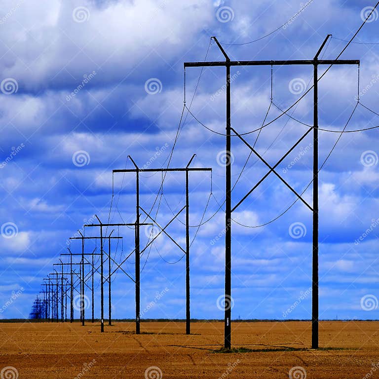 Powerlines in Field with Blue Sky and Clouds Stock Photo - Image of ...