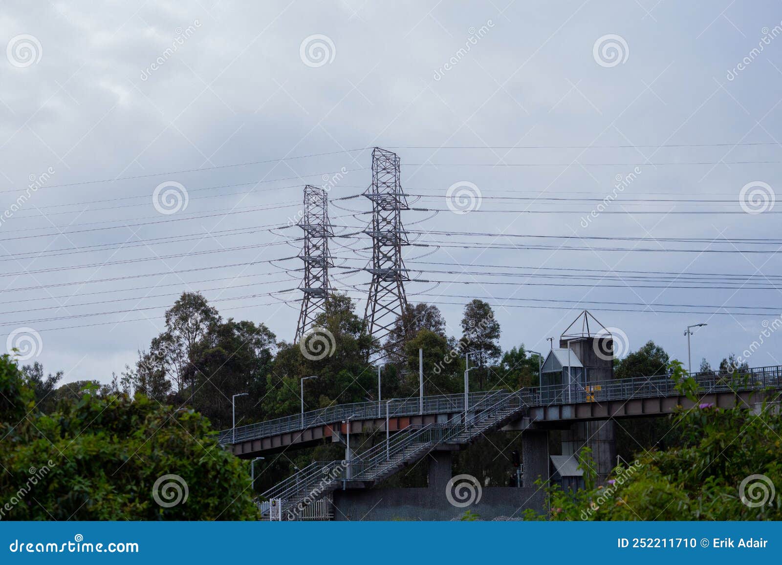 Powerlines over a bridge stock photo. Image of track - 252211710