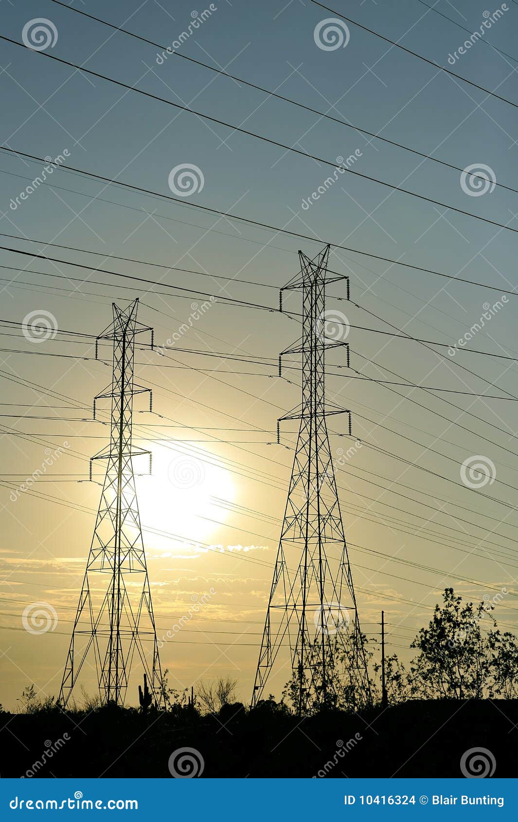 Powerlines at sunset stock photo. Image of pylon, frame - 10416324