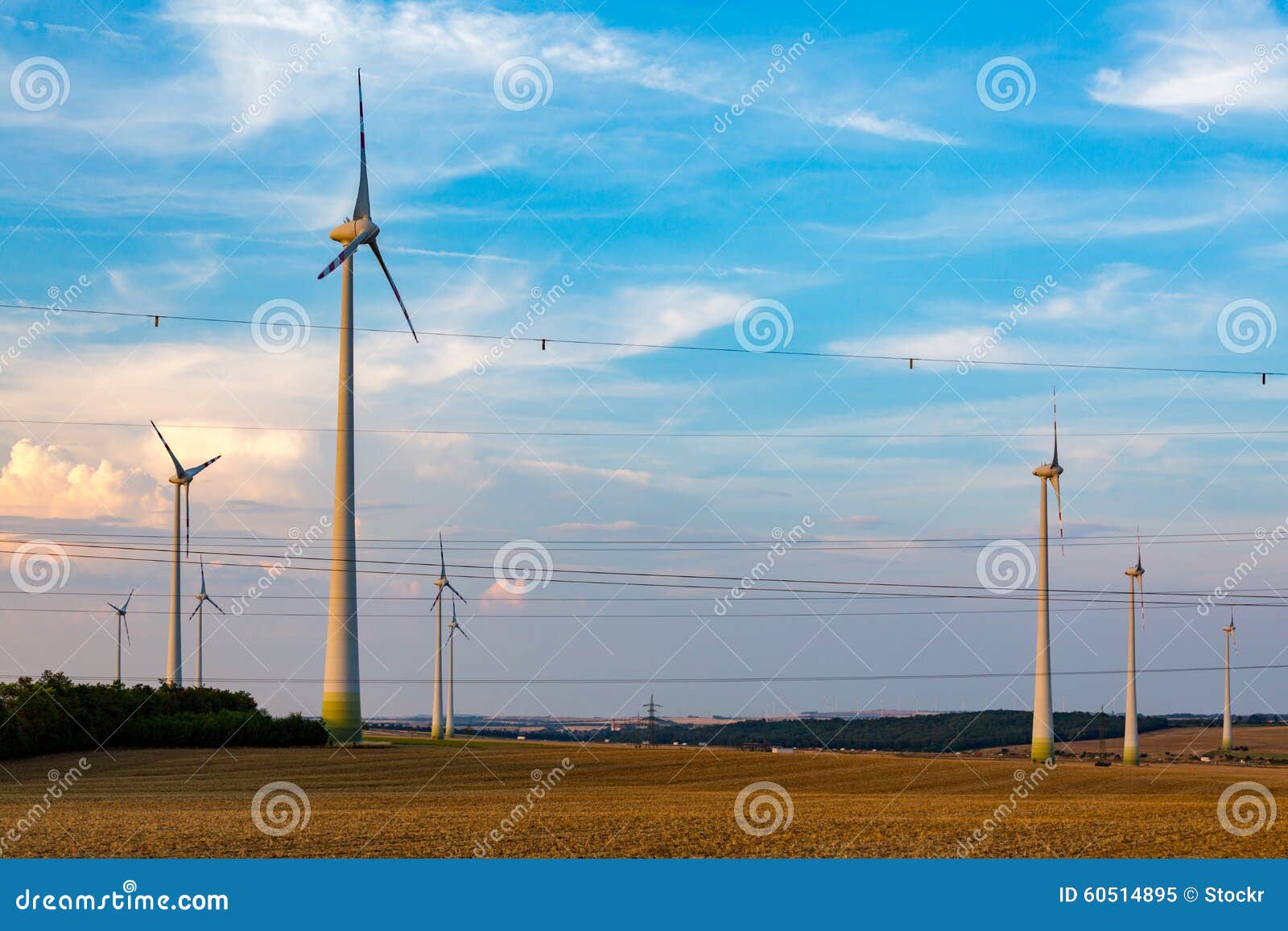 Powerlines and Windmills on the Field Stock Image - Image of equipment ...