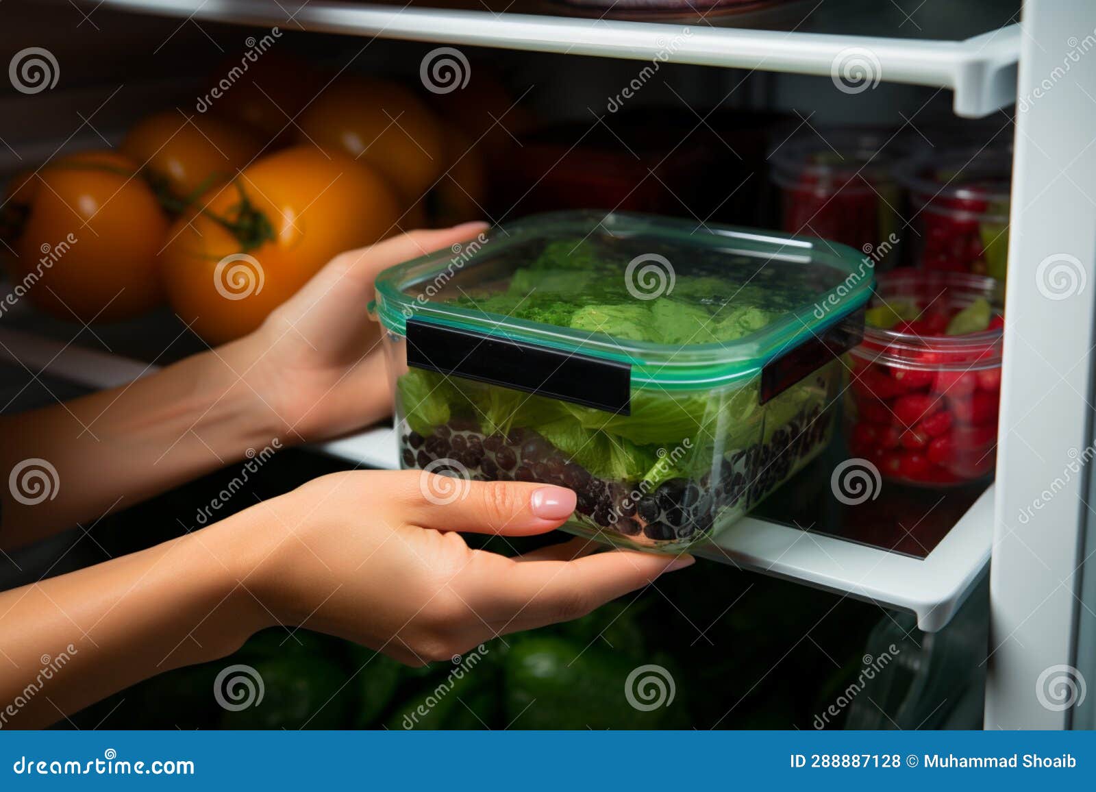 Practicality in Focus Womans Hands Remove Food Container from ...
