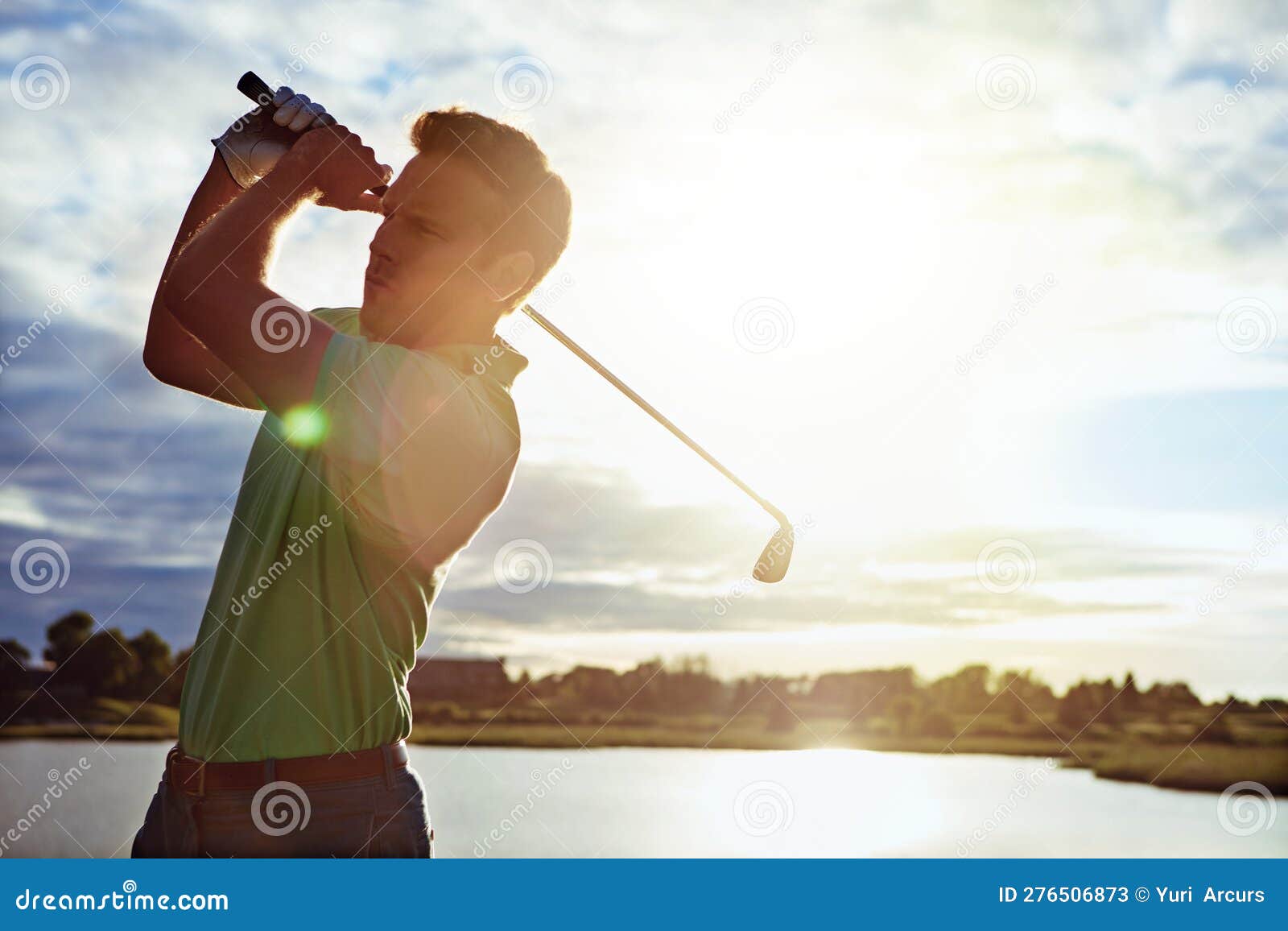 Practice Makes Player of the Year. a Man Practicing His Swing on the ...