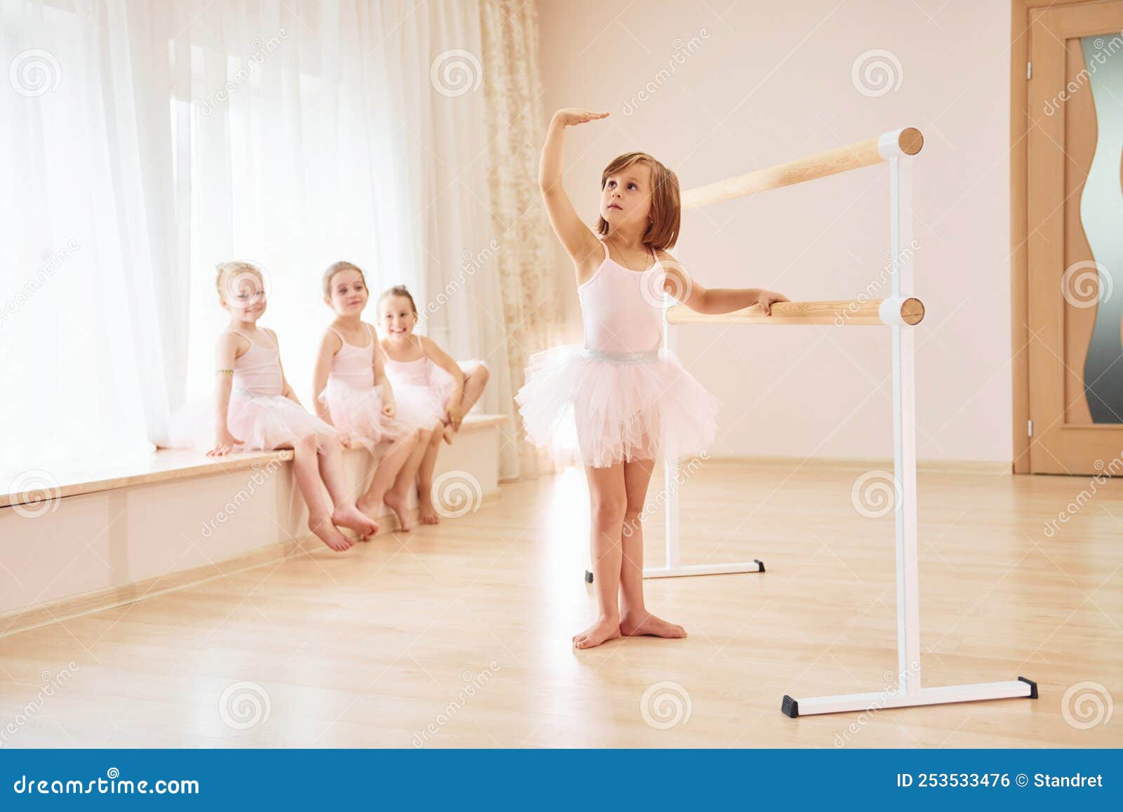 Practicing Dance Moves. Little Ballerinas Preparing for Performance ...