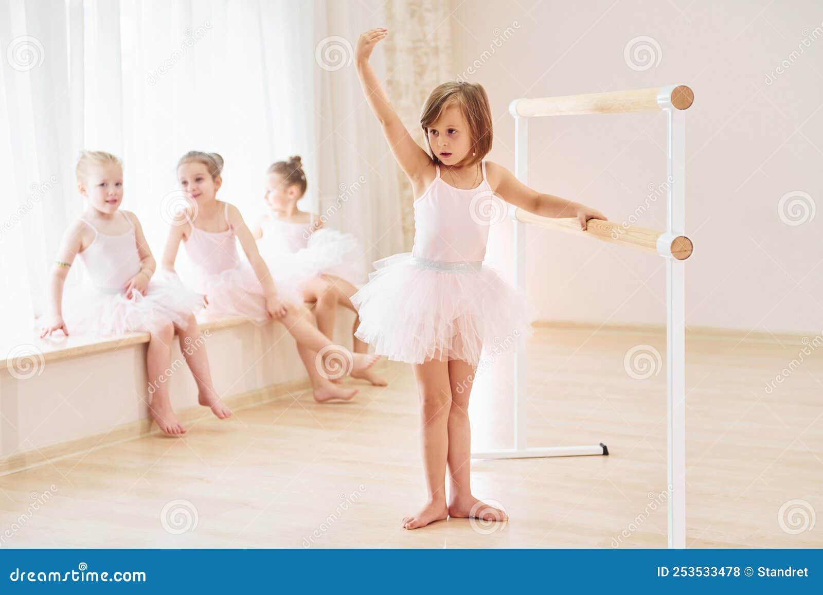 Practicing Dance Moves. Little Ballerinas Preparing for Performance ...