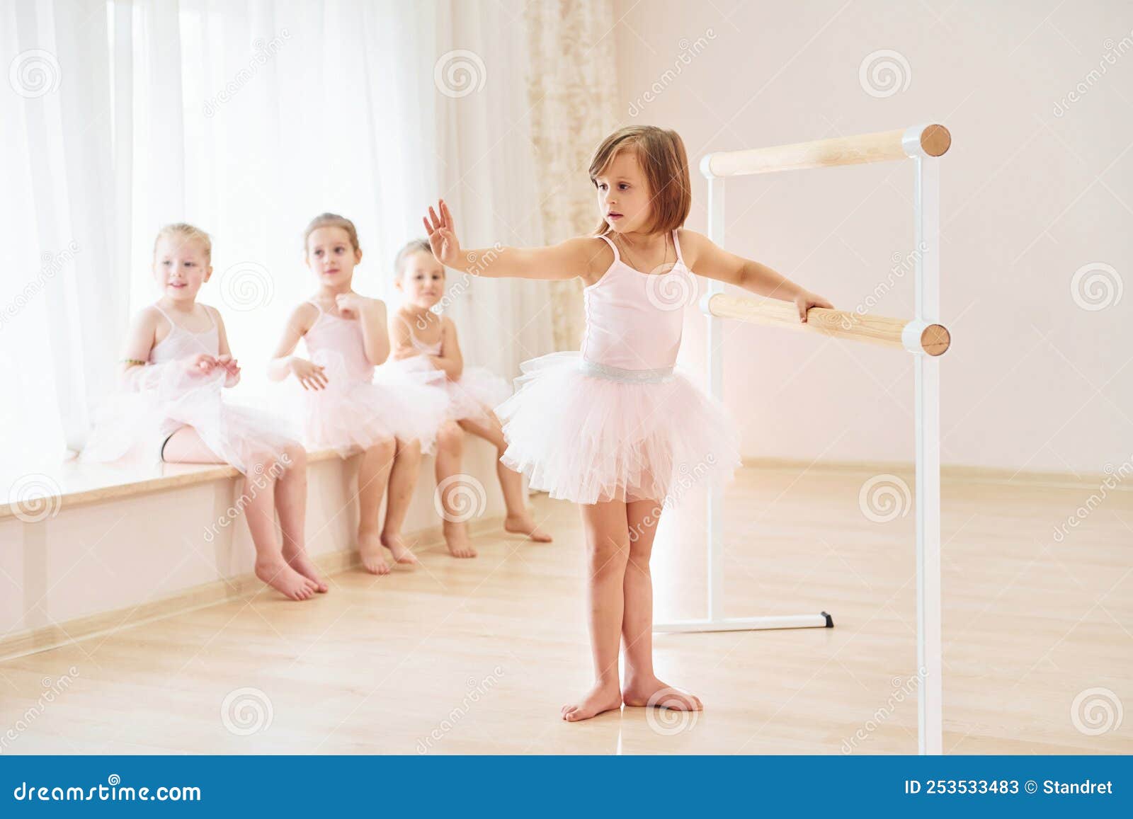 Practicing Dance Moves. Little Ballerinas Preparing for Performance ...