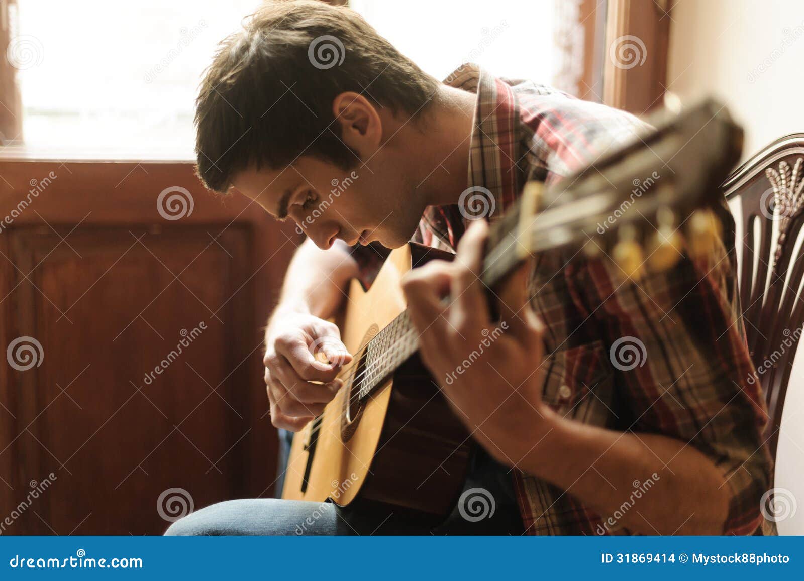Practicing in Playing Guitar Stock Photo - Image of finger, handsome ...