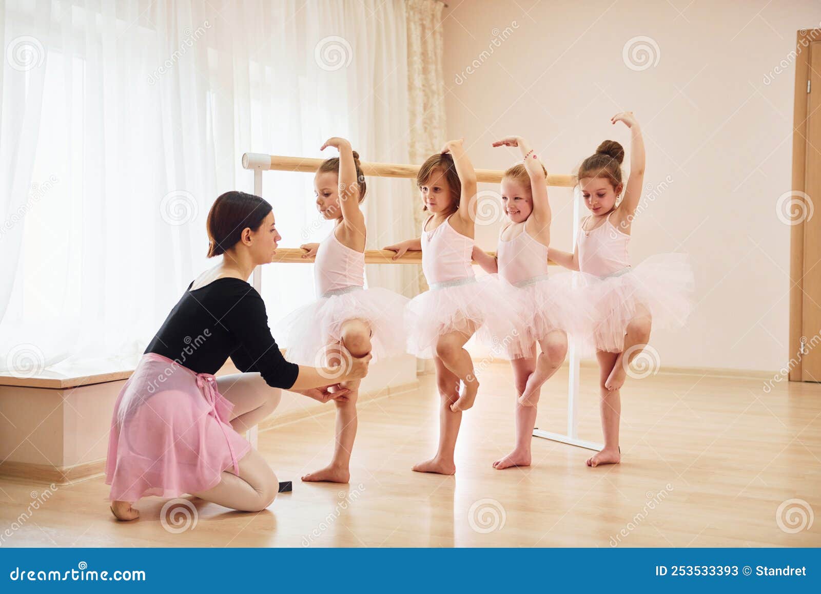 Practicing Pose. Little Ballerinas Preparing for Performance Stock ...