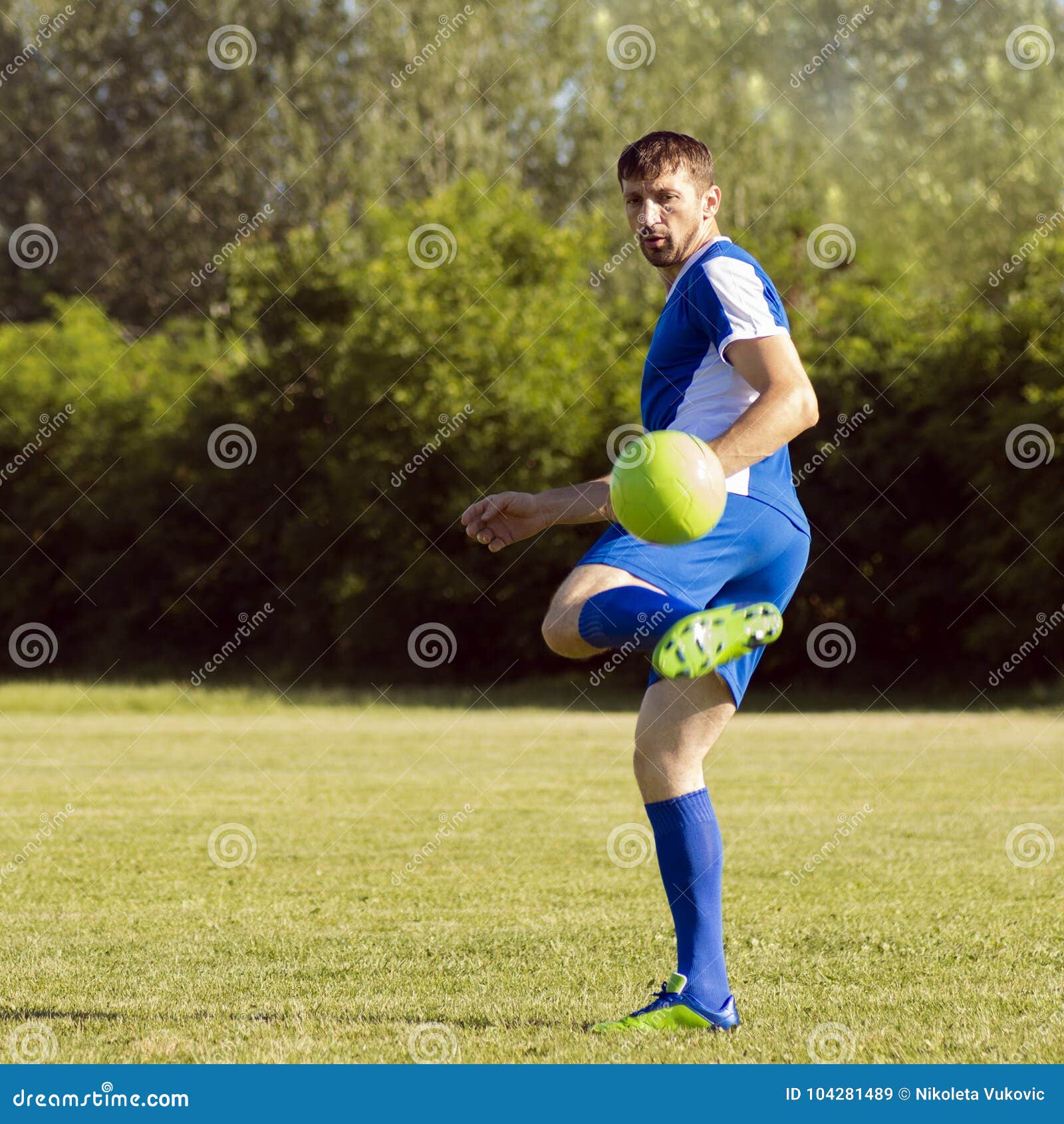 Practicing soccer player stock image. Image of player - 104281489