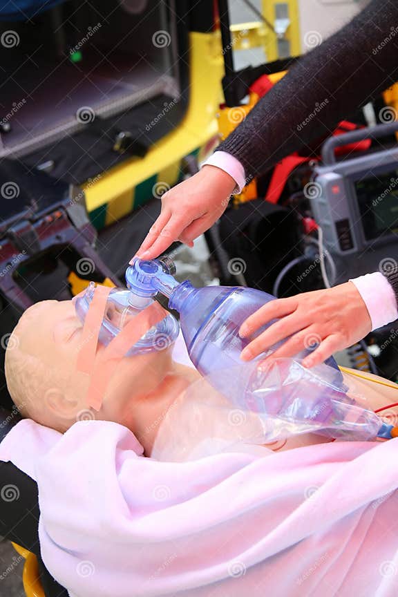 Practicing To Use an Oxygen Mask on Training Doll Stock Image - Image ...