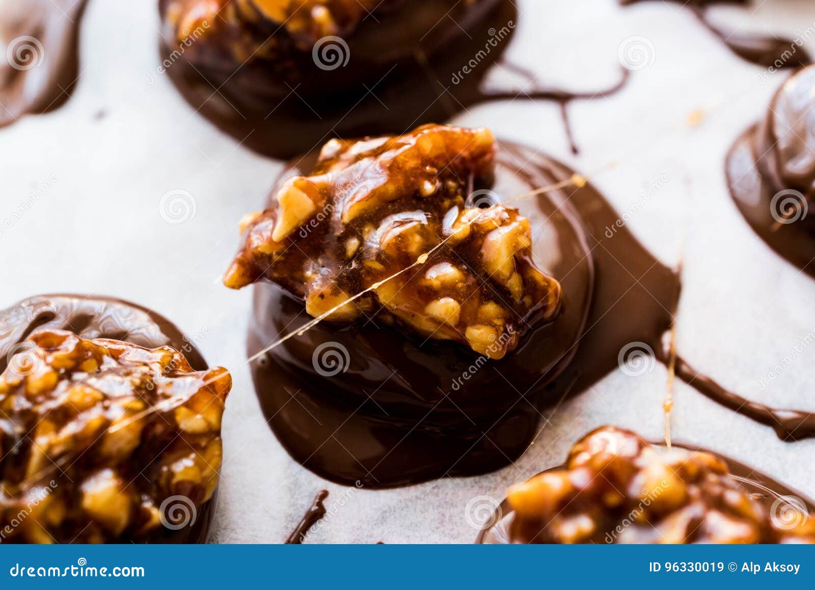 Praline Chocolate with Walnut, Almond, Peanut or Croquant Stock Image ...
