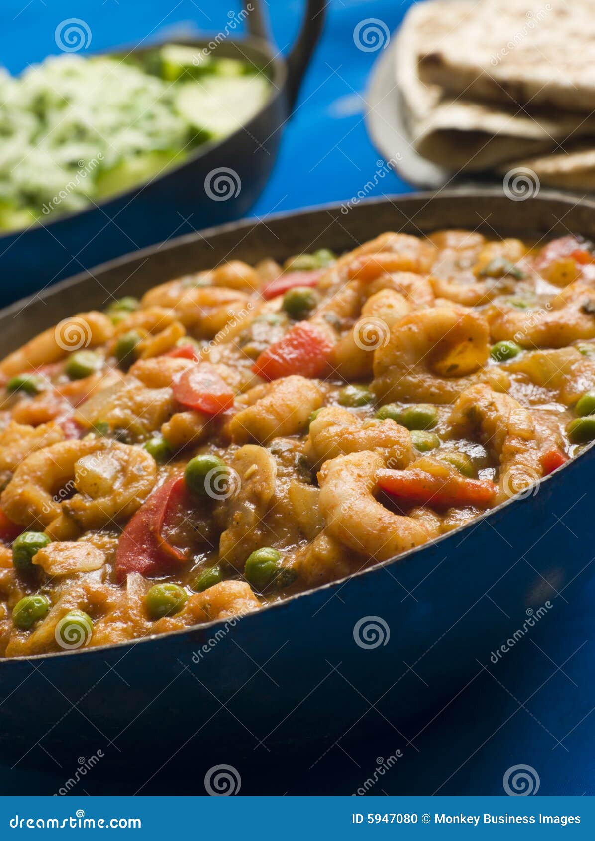 Prawn Patia with Green Rice and Chapatti Stock Photo - Image of cumin ...