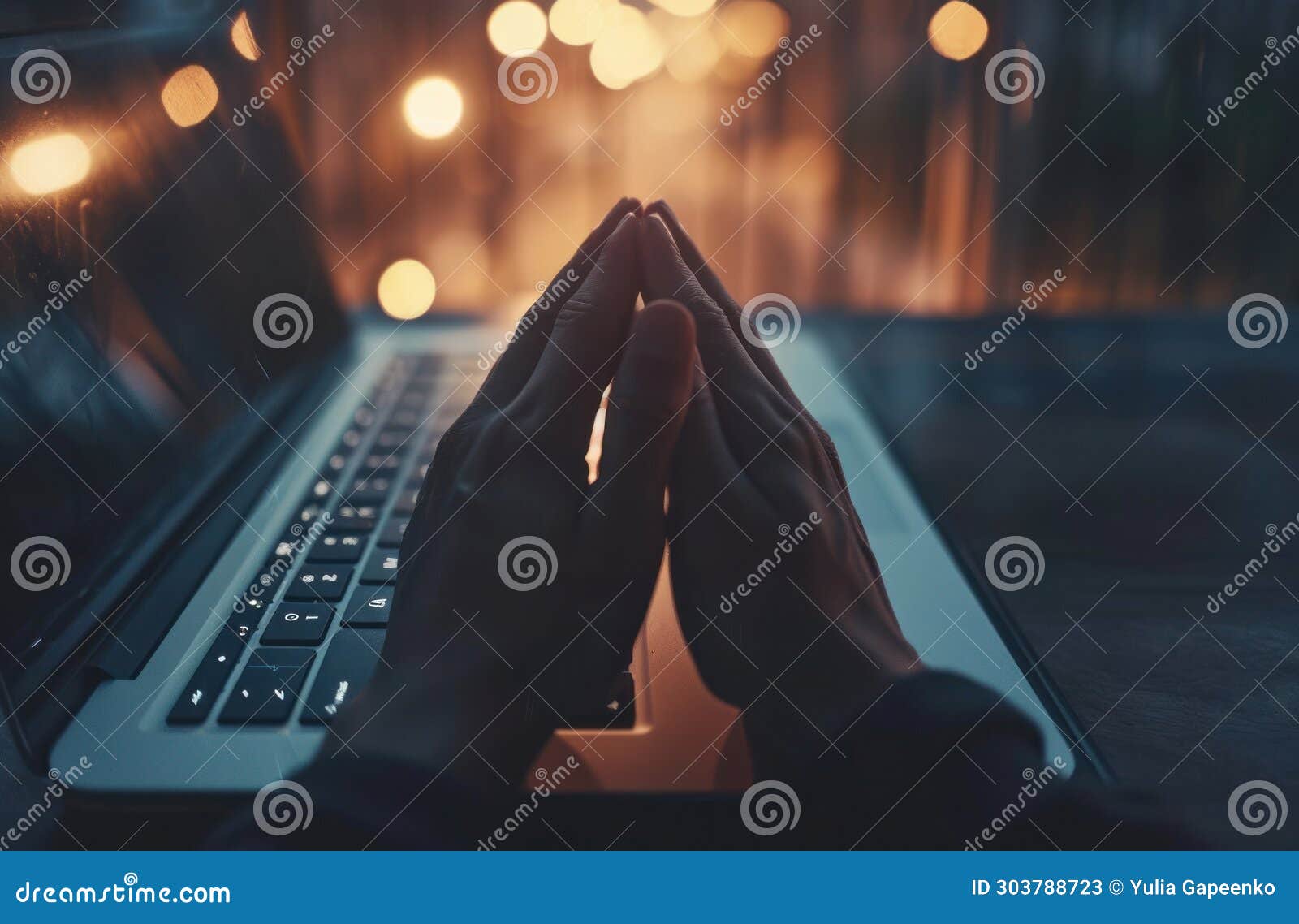 Prayer with Hands on the Forehead on the Keyboard of a Laptop Stock ...