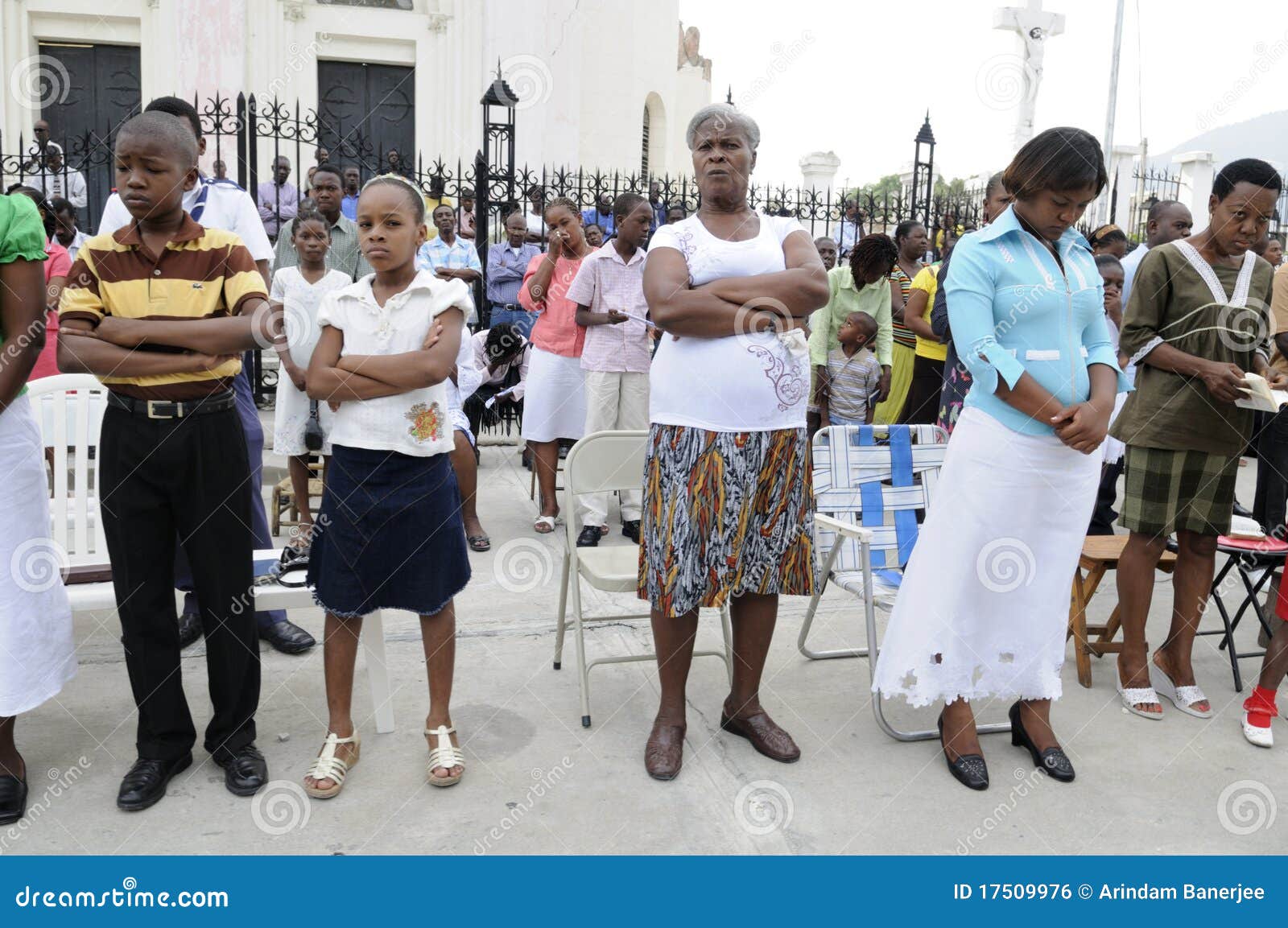 Prayer outside a church. editorial photo. Image of concrete - 17509976