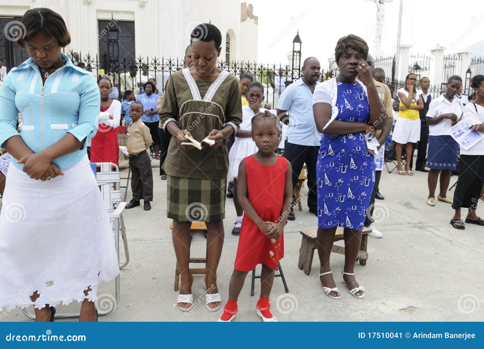 Prayer outside a church. editorial photo. Image of haitian - 17510041