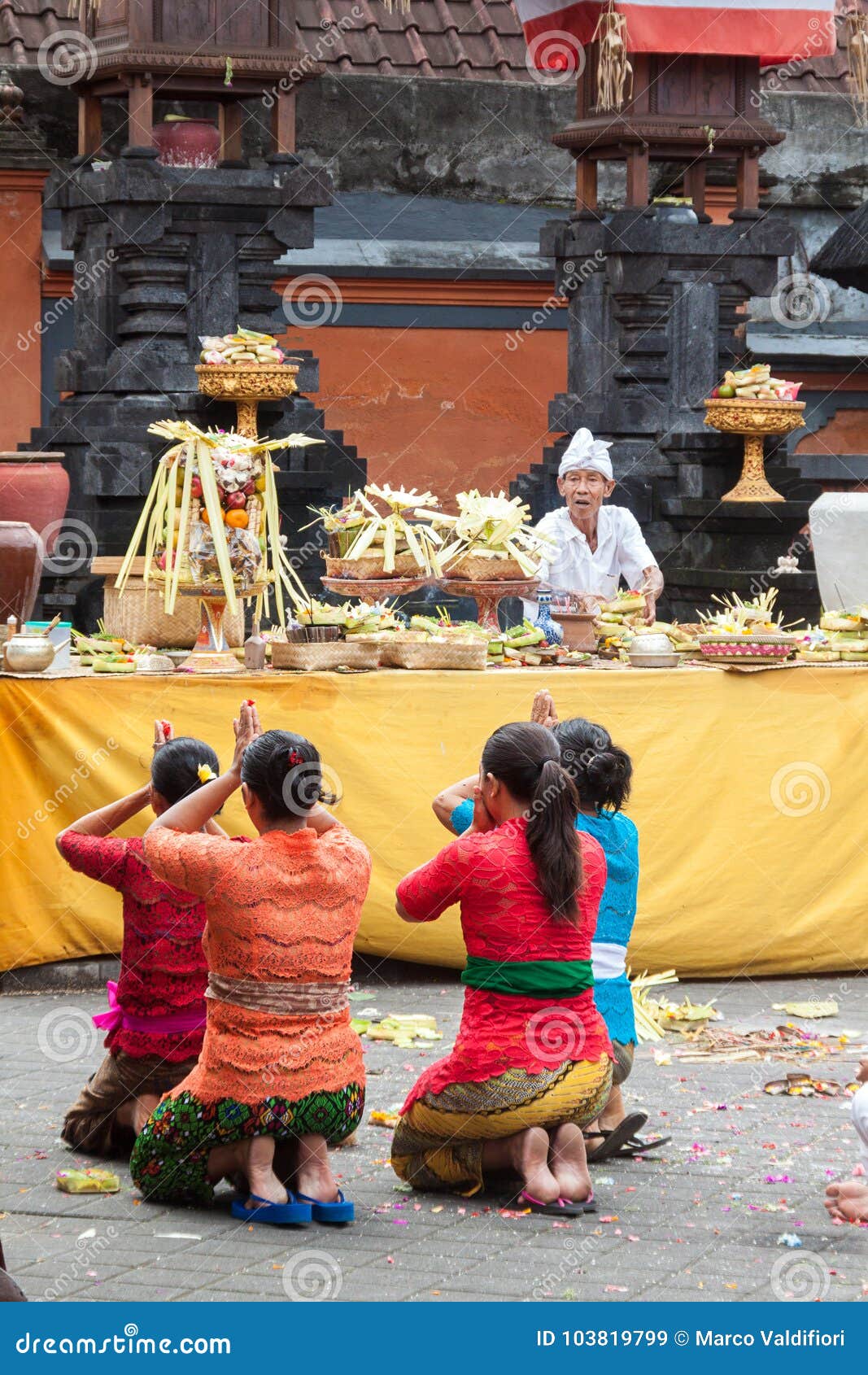 Prayers at temple, Bali editorial stock image. Image of flower - 103819799