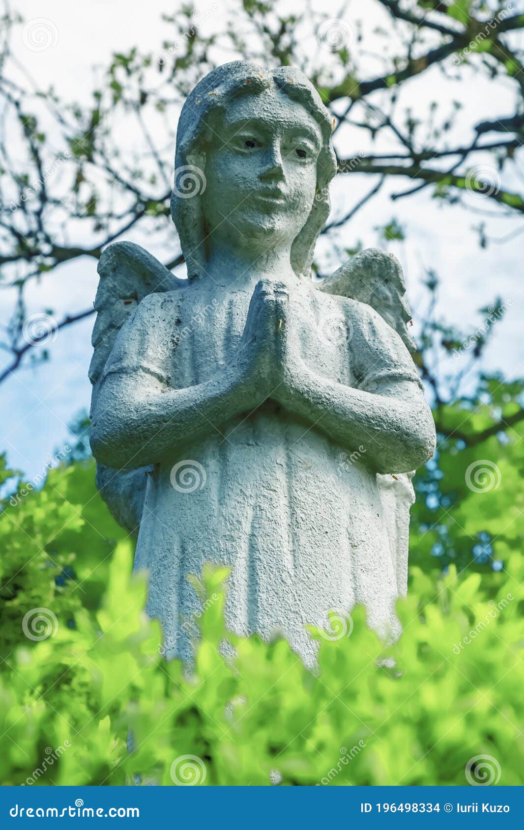 Sad Angel. Ancient Stone Statue With A Sweet Expression As Symbol Of ...