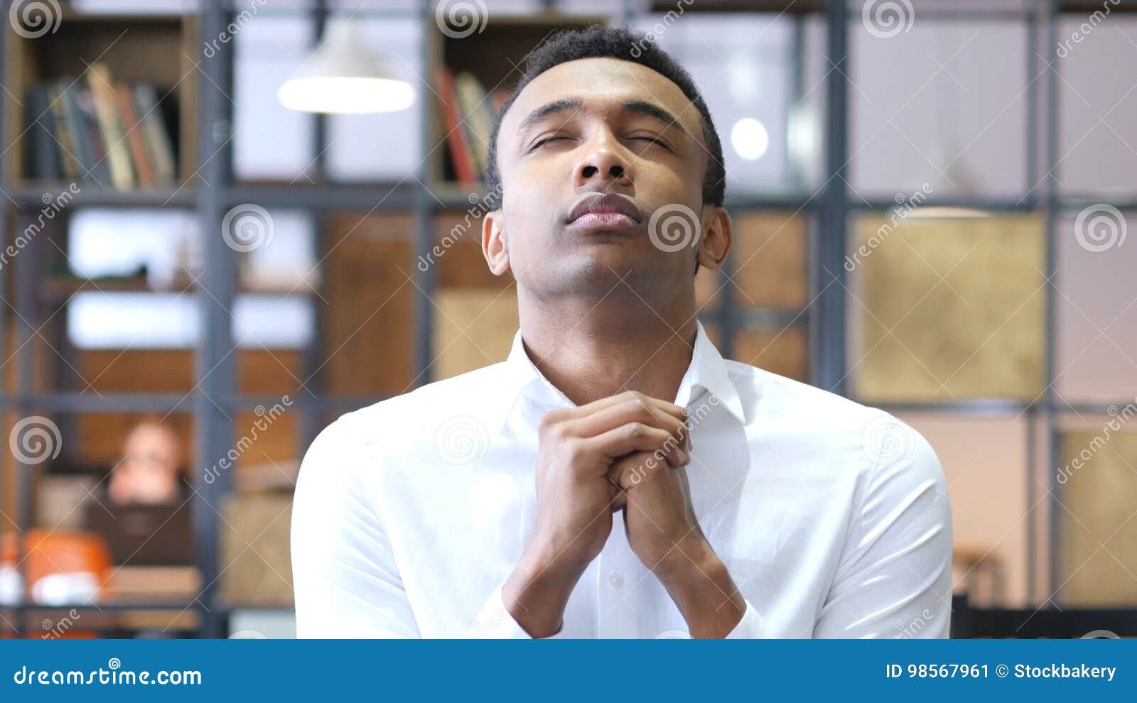 Praying Black Man in Office Stock Image - Image of white, casual: 98567961