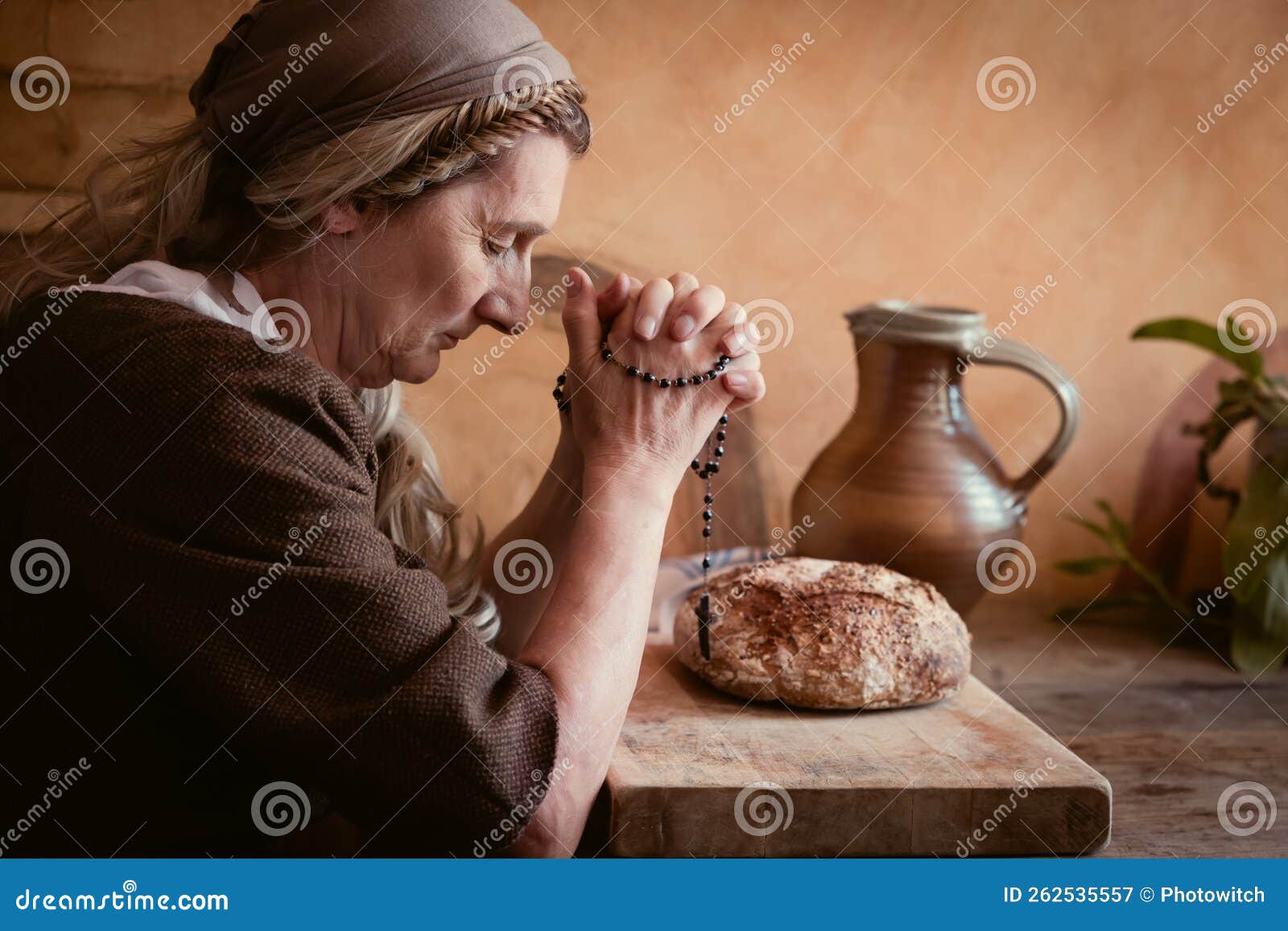 Praying for bread stock image. Image of hand, praying - 262535557