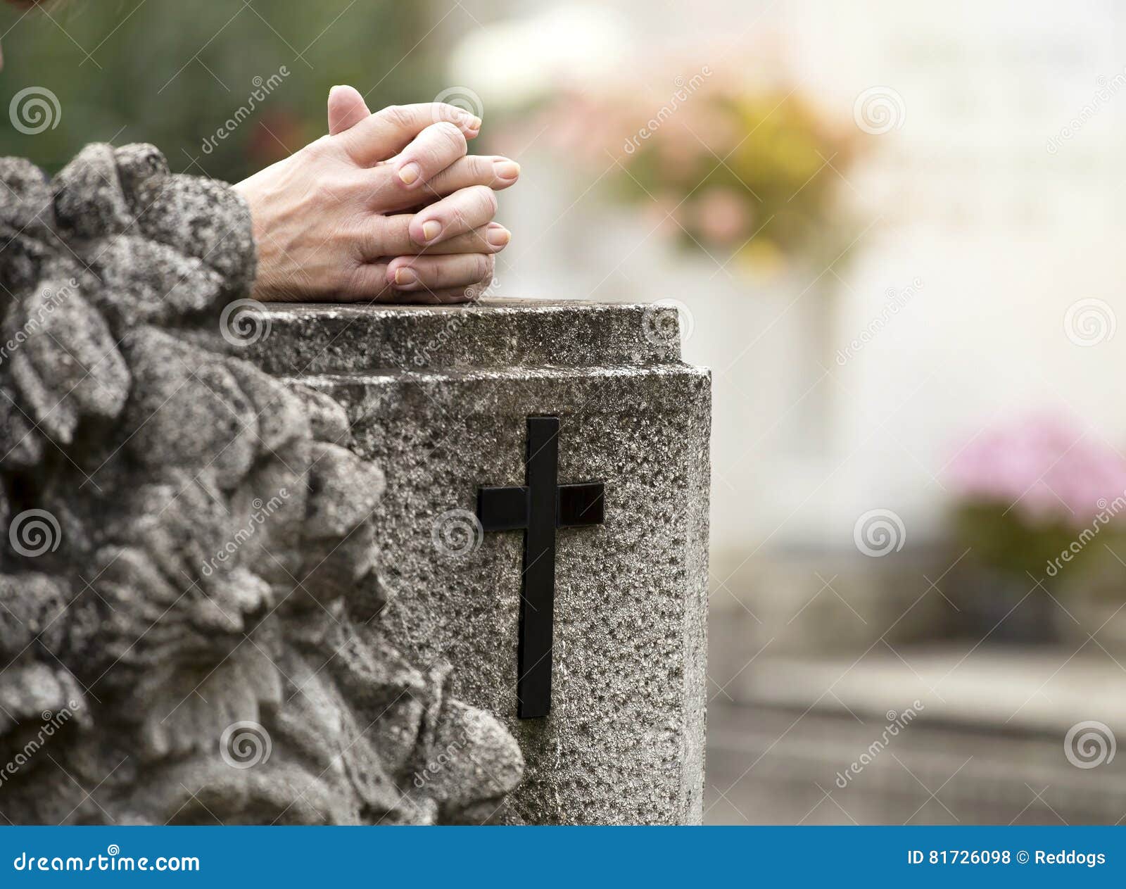 Praying in cemetery stock photo. Image of death, remembrance - 81726098