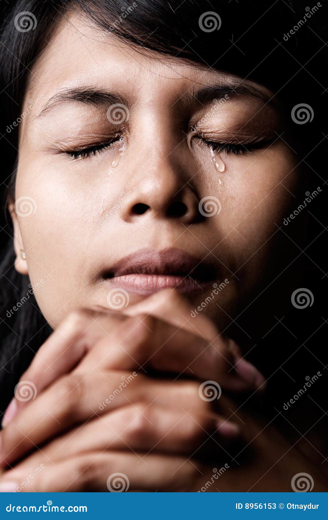 Praying and crying stock image. Image of crying, head - 8956153