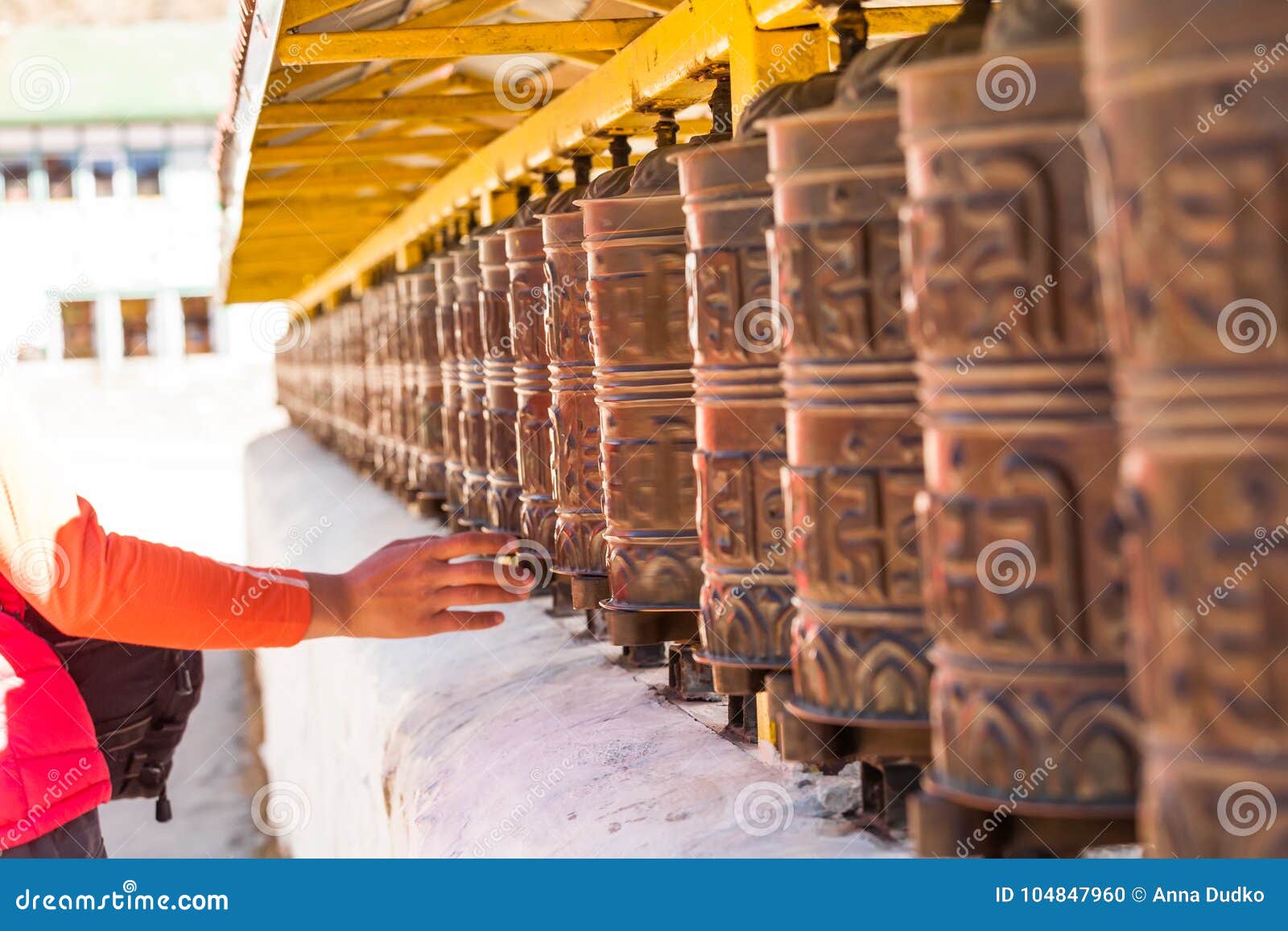 Praying Drums. Line Of Vintage Copper Praying Drums With Sanskrit ...
