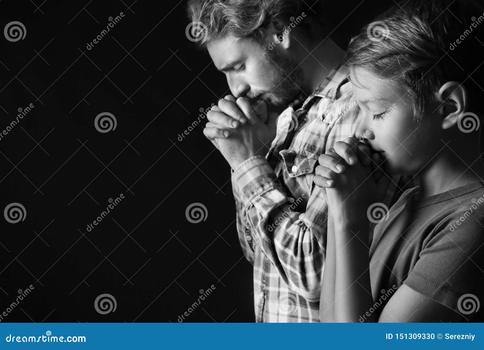 Praying Father and Son on Dark Background Stock Photo - Image of ...