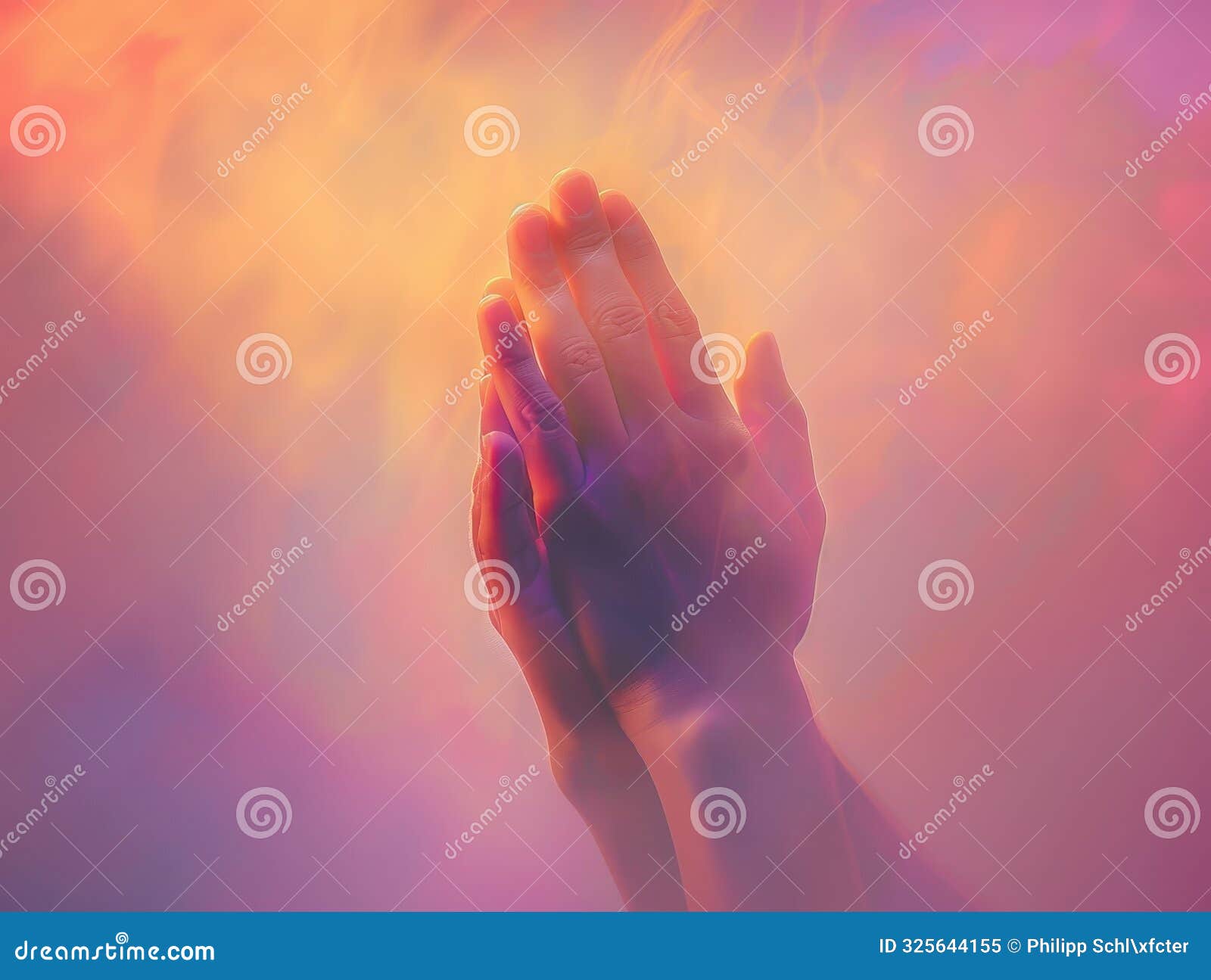 Praying Hands Clasped Together Against a Tranquil Pink and Orange ...