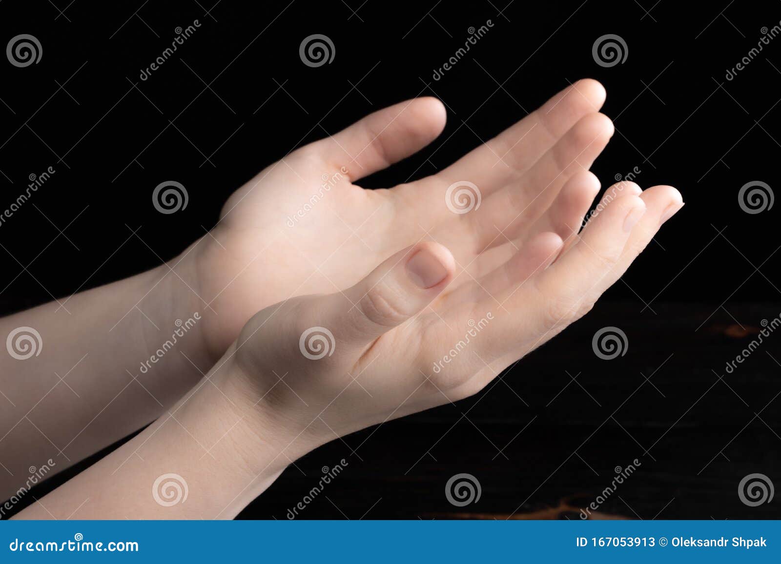 Praying Hands is in the Dark with Light on the Hands Stock Image ...