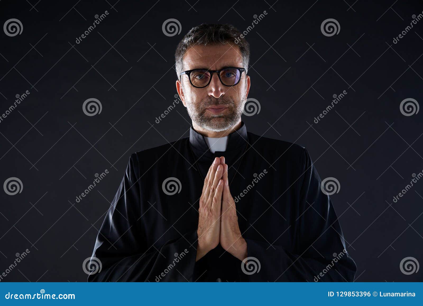 Hands Of Priest Raise A Communion Bread In Church Stock Image ...