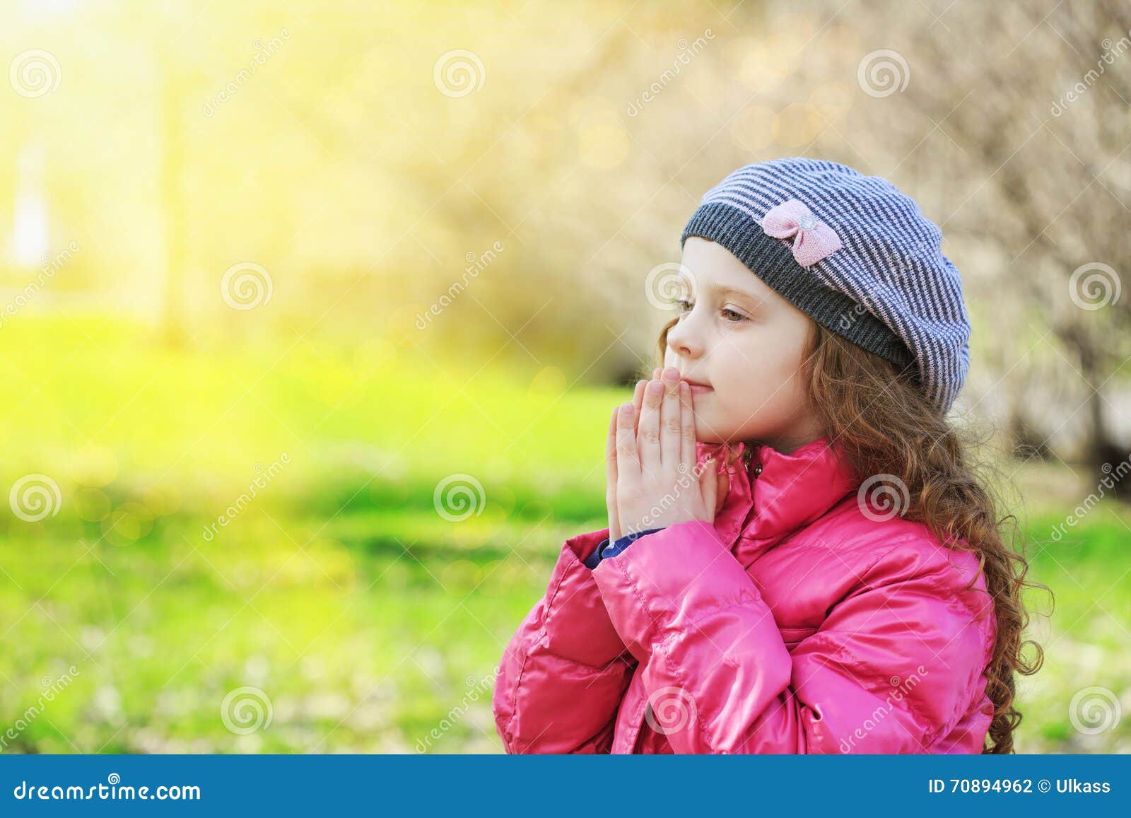 Praying Little Girl in Spring Park. Stock Photo - Image of people ...